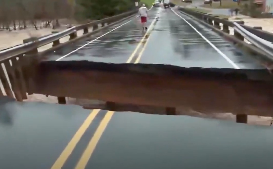 WATCH: Bridge Collapses While Reporter is Live On-Air - WIBC 93.1 FM