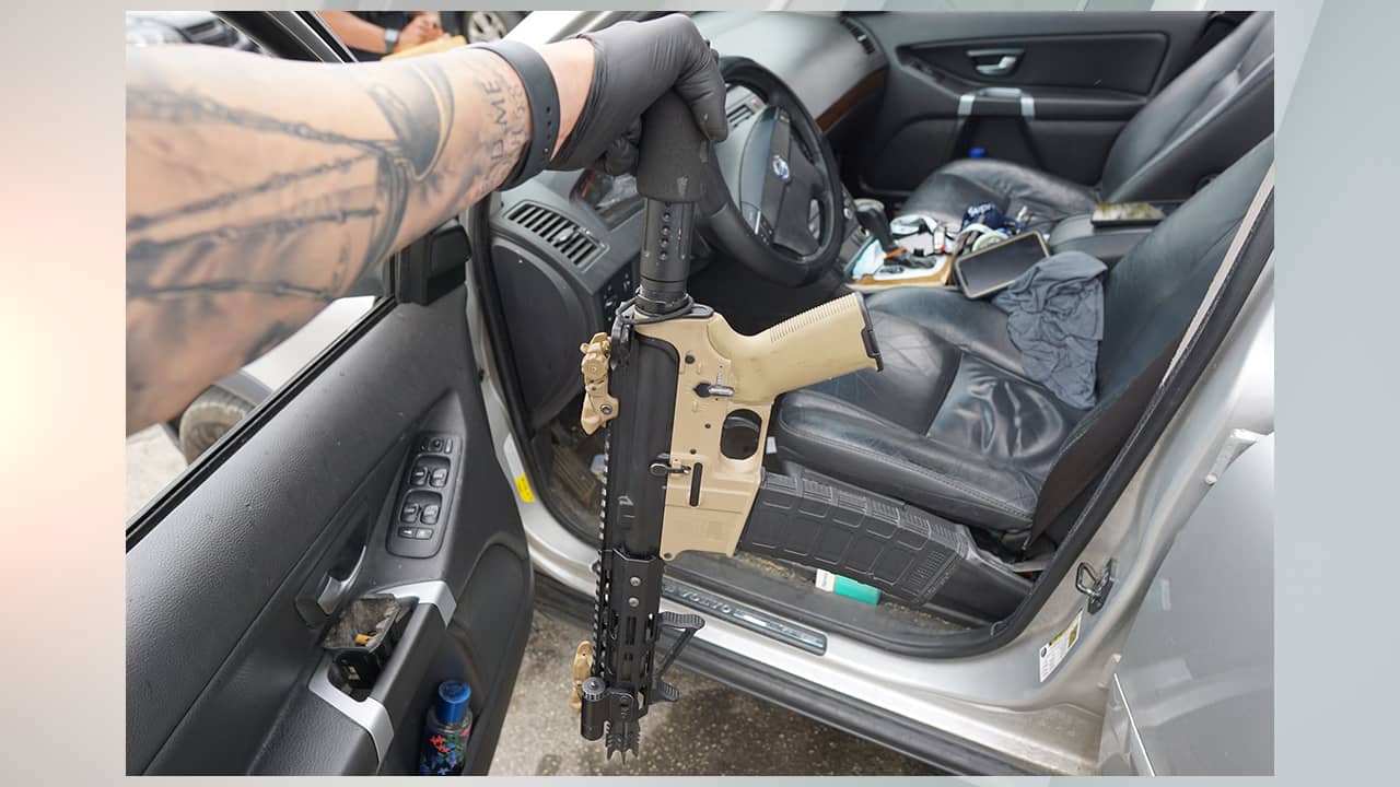 IMPD Arrests Men Seen Waving Guns Out Windows, Sunroof During Funeral ...