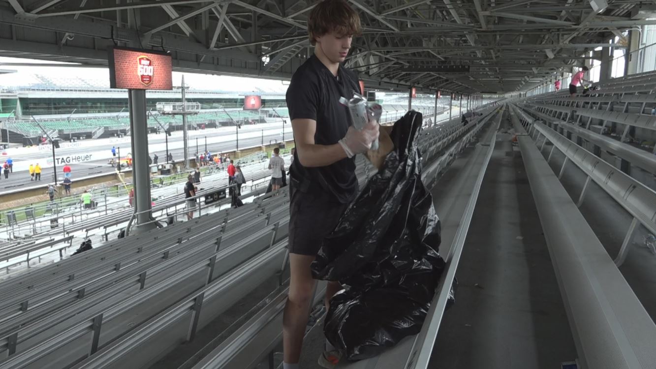 High School Football Team Among Many Volunteers To Help Clean Up IMS